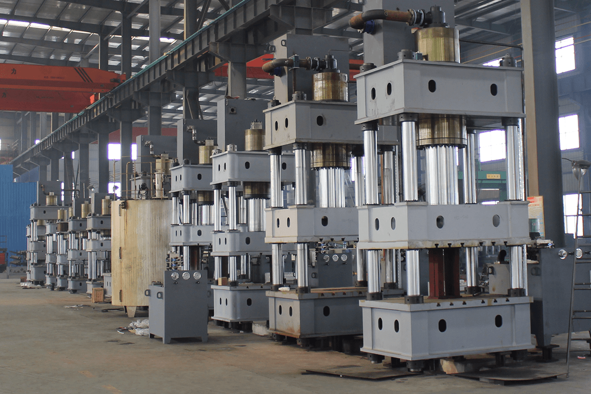 Mesin Press Hidraulik Empat Kolom | MesinMFG